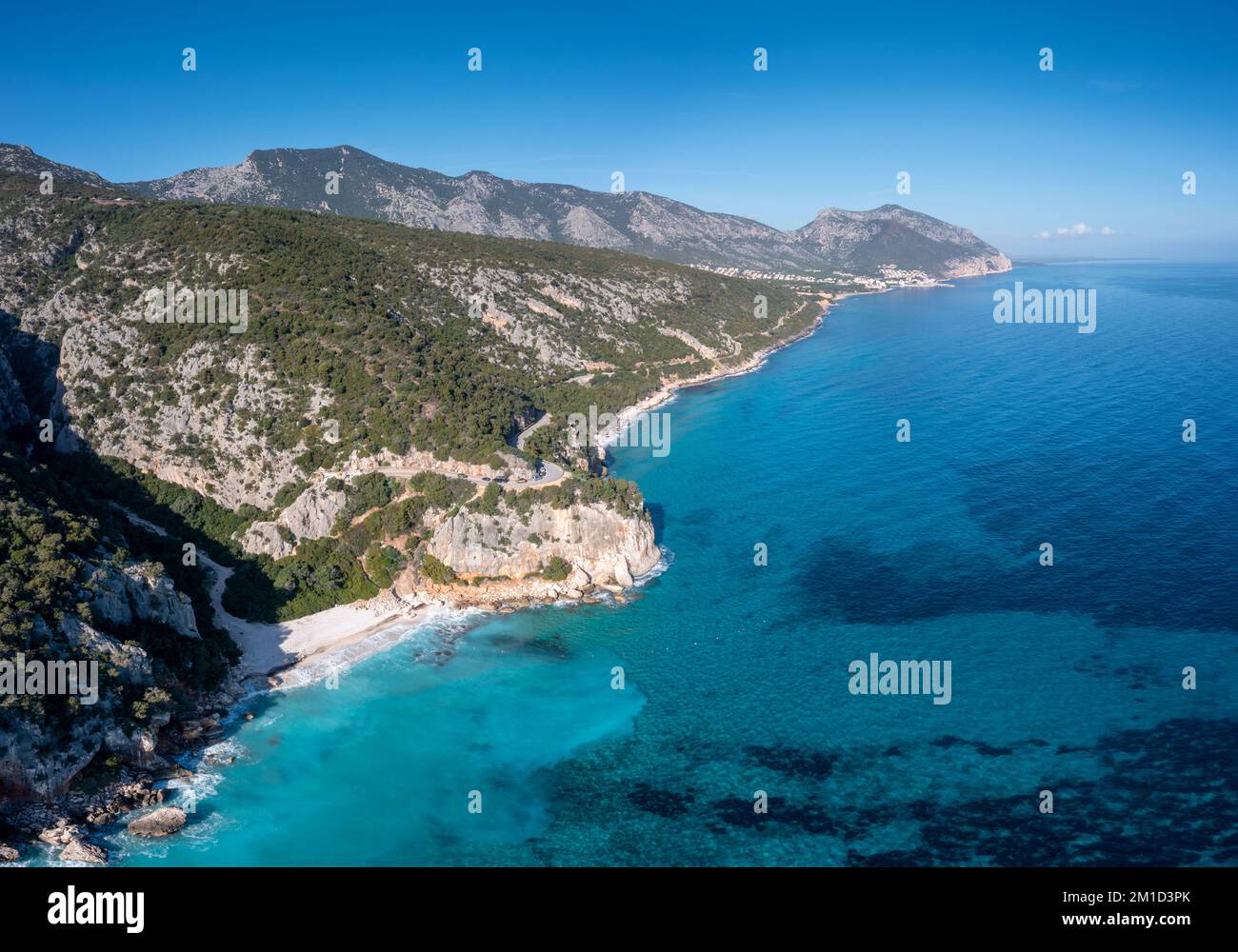 Aerial view of the rugged mountainous coast near Cala Gonone with ...