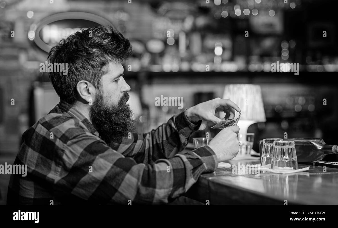 Alcohol drinks concept. Guy spend leisure in bar Stock Photo - Alamy