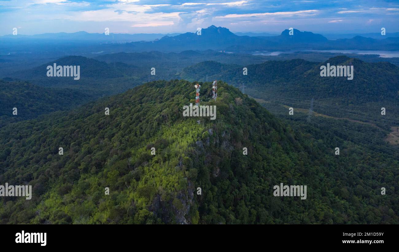 Aerial view of beautiful morning scenery with golden sunrise and fog ...