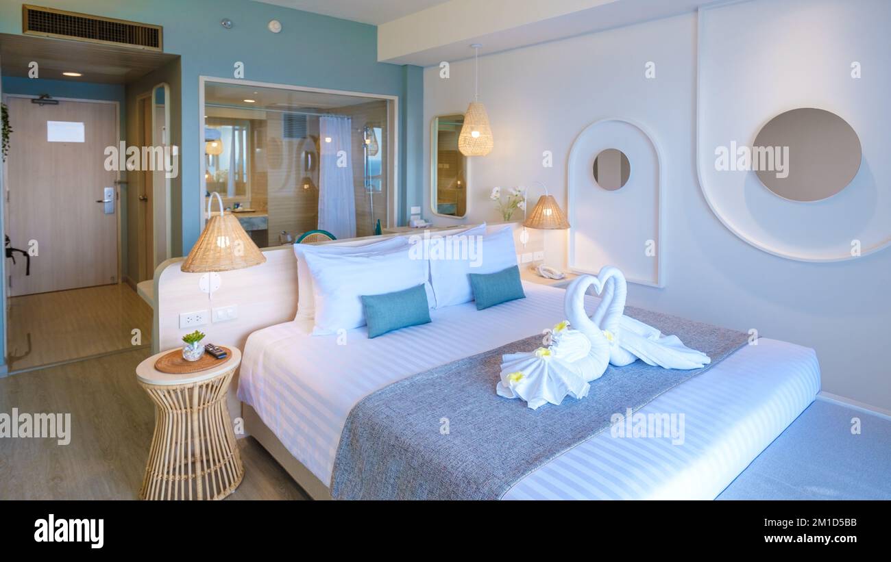 A hotel room with sea view and bright fresh colors in Bali style ...