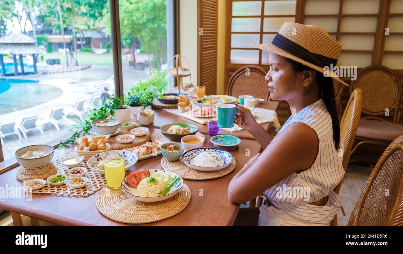 Asian Thai women having Luxury breakfast in the hotel Stock Photo - Alamy