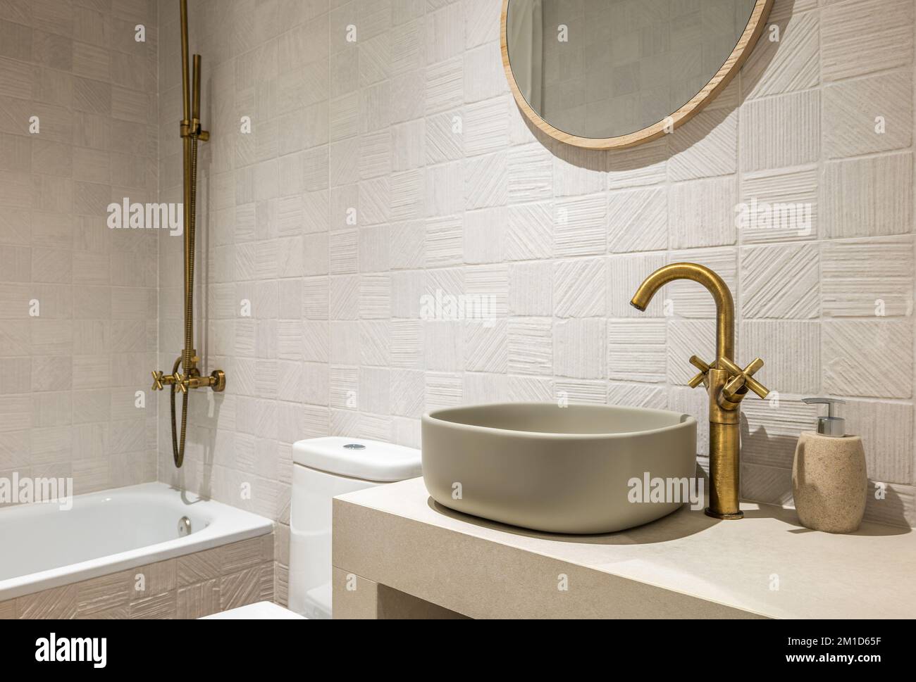Bright bathroom in soothing pastel colors with textured ceramic tiles ...