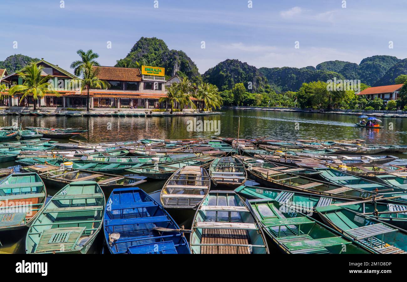 Boats in the river of Tam Coc near Ninh Binh, Vietnam Stock Photo - Alamy
