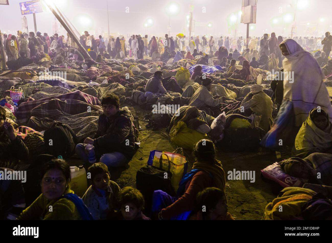 Millions of people gathering at Kumbha Mela ground, sitting and ...