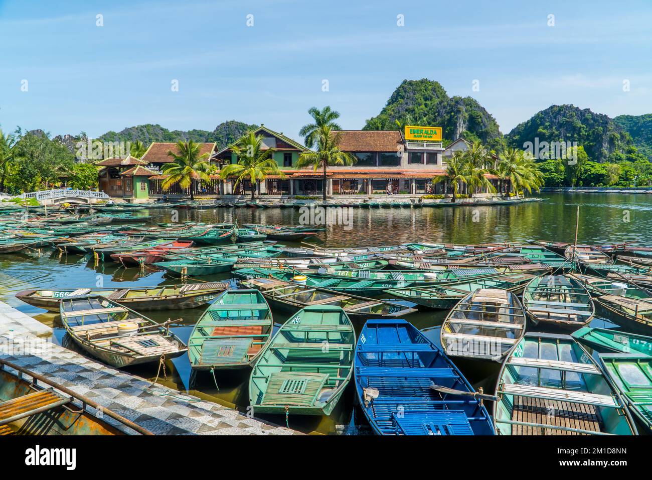 Boats in the river of Tam Coc near Ninh Binh, Vietnam Stock Photo - Alamy