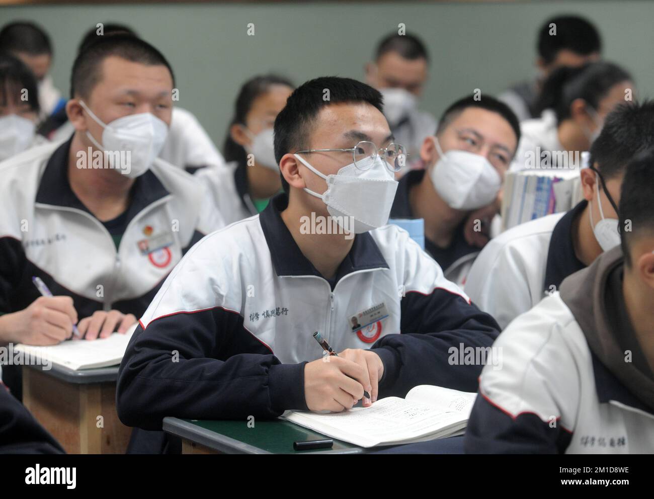 URUMQI, CHINA - DECEMBER 12, 2022 - Senior three students wear masks ...
