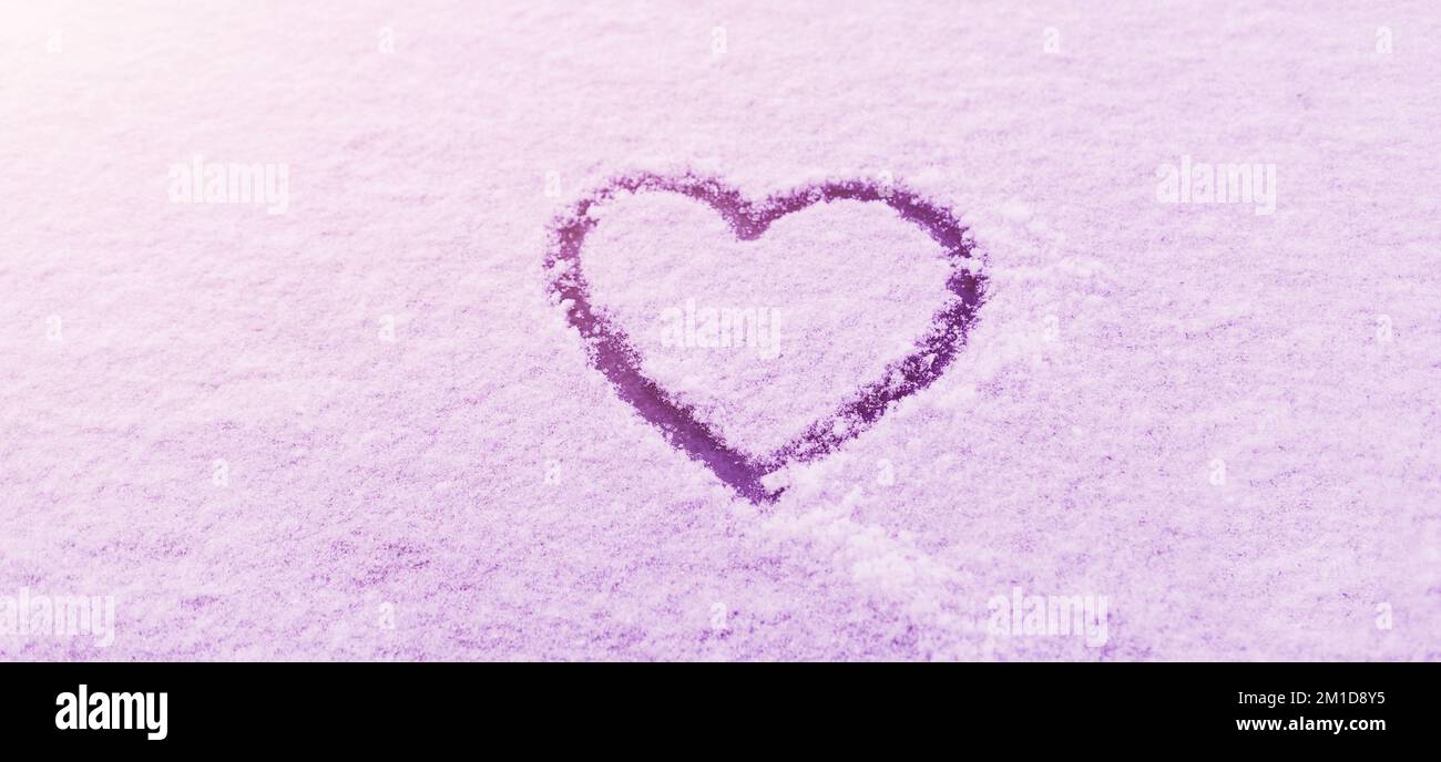 Heart symbol drawn on the snow, on winter day. Romance. Valentine's Day ...