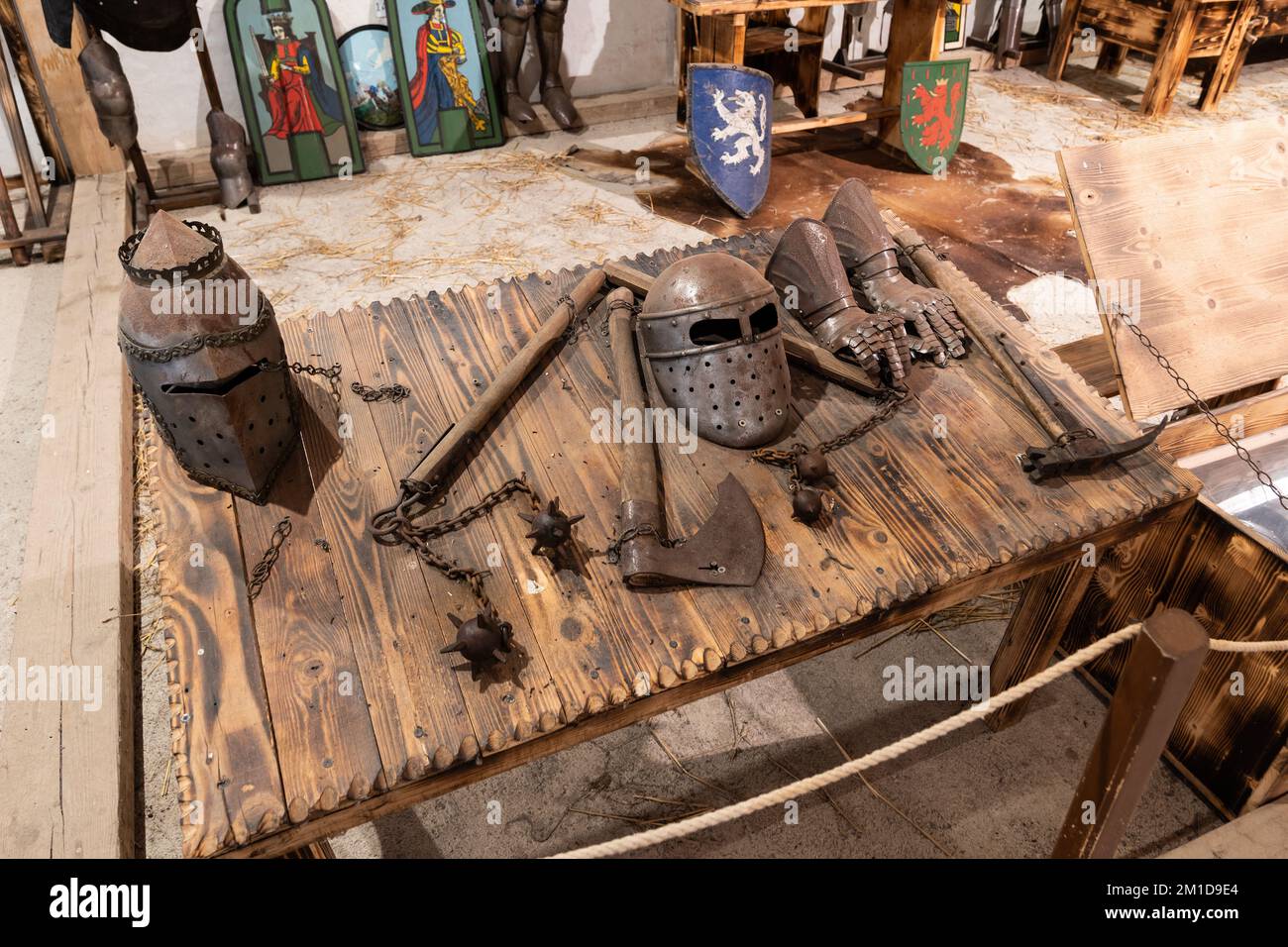 Predjama Castle interior, Slovenia, medieval armoury room, on the table ...