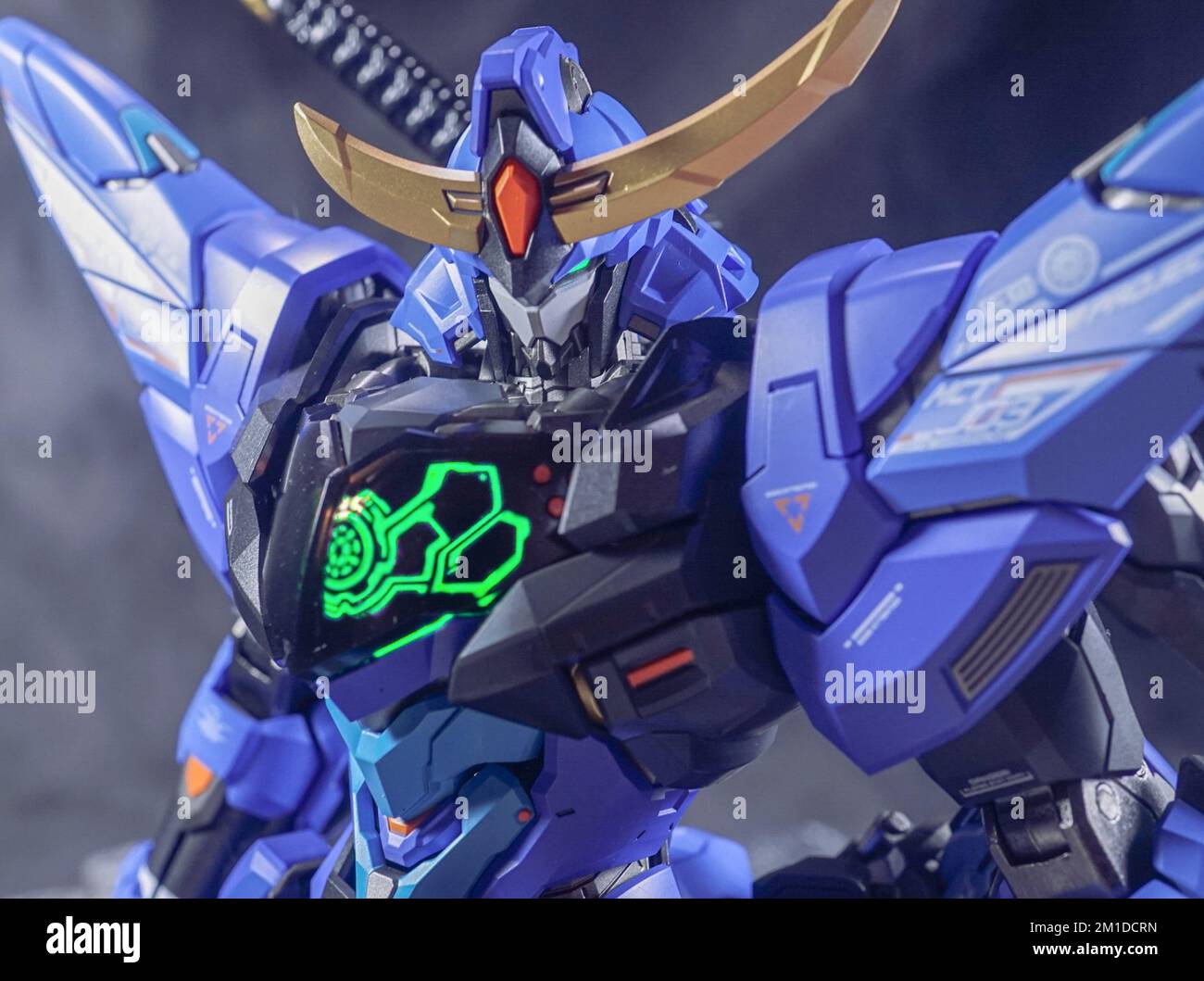 A closeup of Moshow Progenitor Effect Masamune Date figure on dark ...