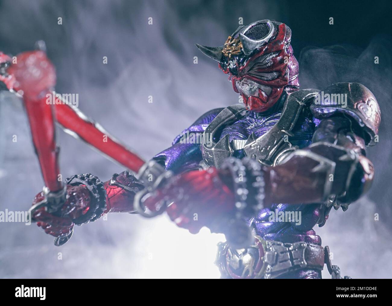 A closeup shot of SIC Kamen Rider Hibiki Base Form figure on dark background filled with smoke ...