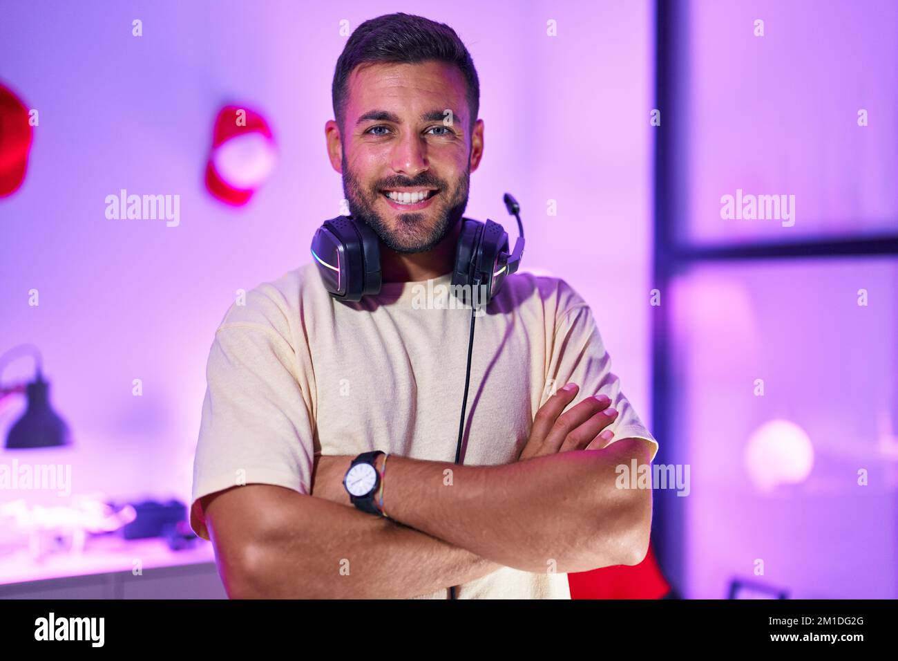 Young hispanic man streamer smiling confident standing with arms ...