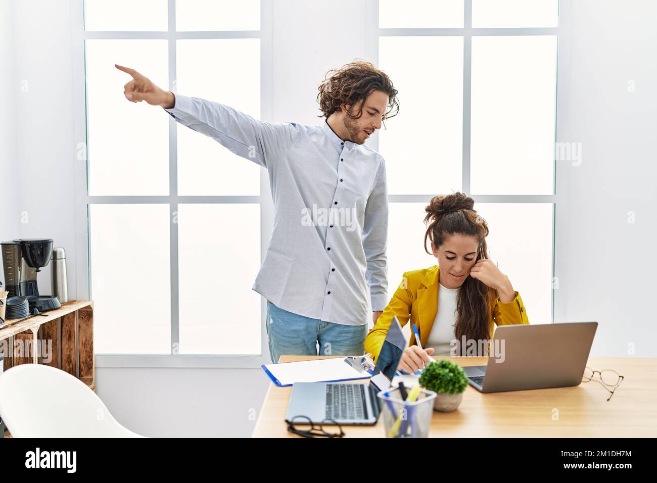 Man and woman business workers employee fired at office Stock Photo - Alamy