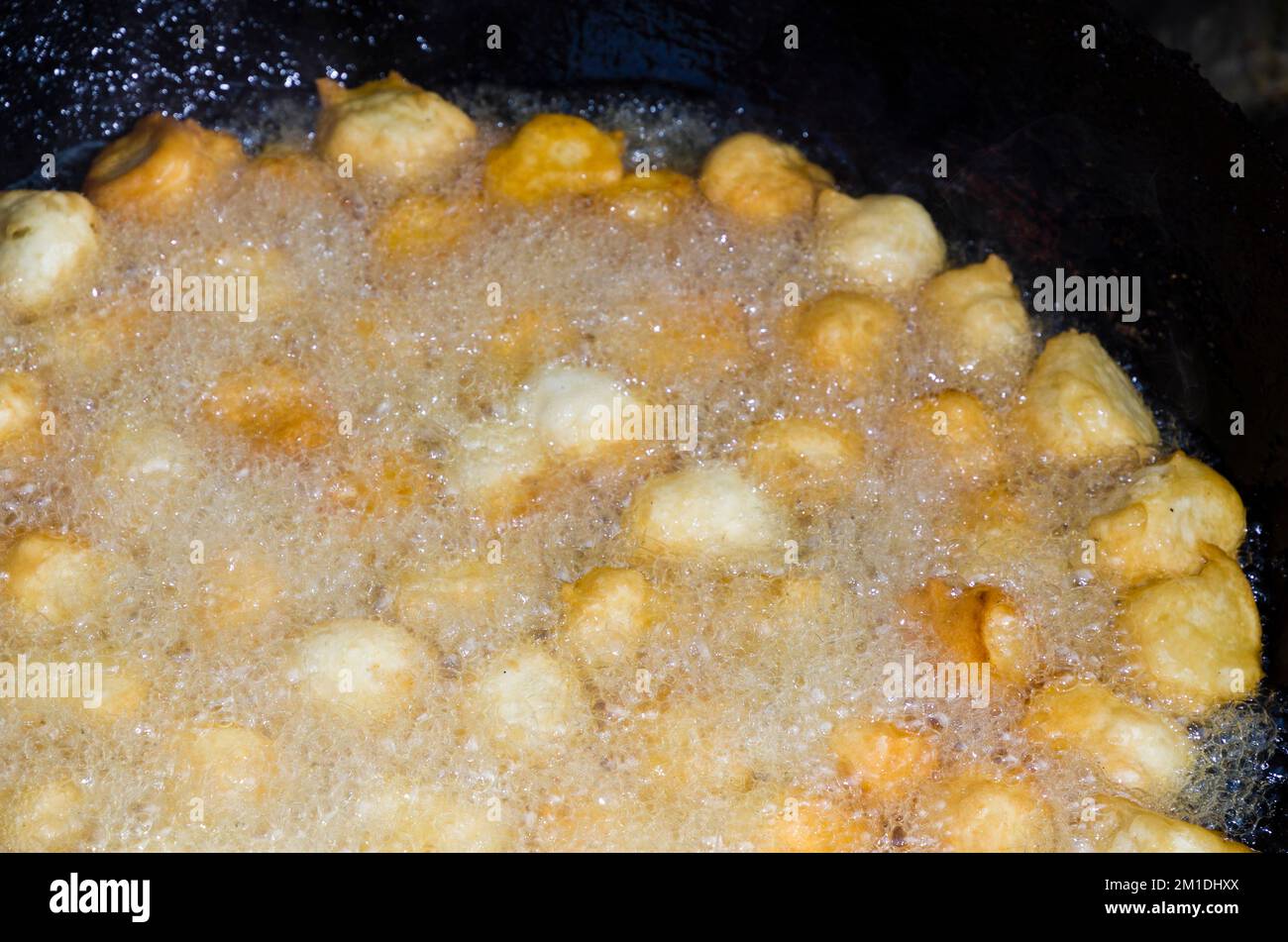 Pan with frying sweets Stock Photo - Alamy