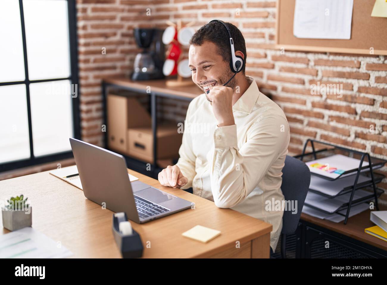 Young man call center agent having video call at office Stock Photo - Alamy