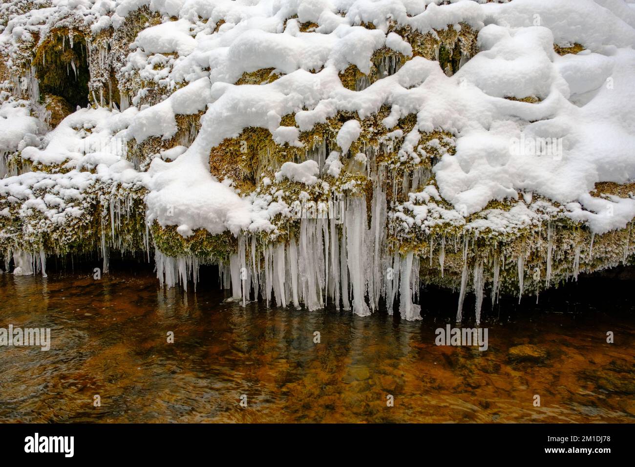 Freshwater limestone outcrop. Raunas Staburags is frozen with icicles ...