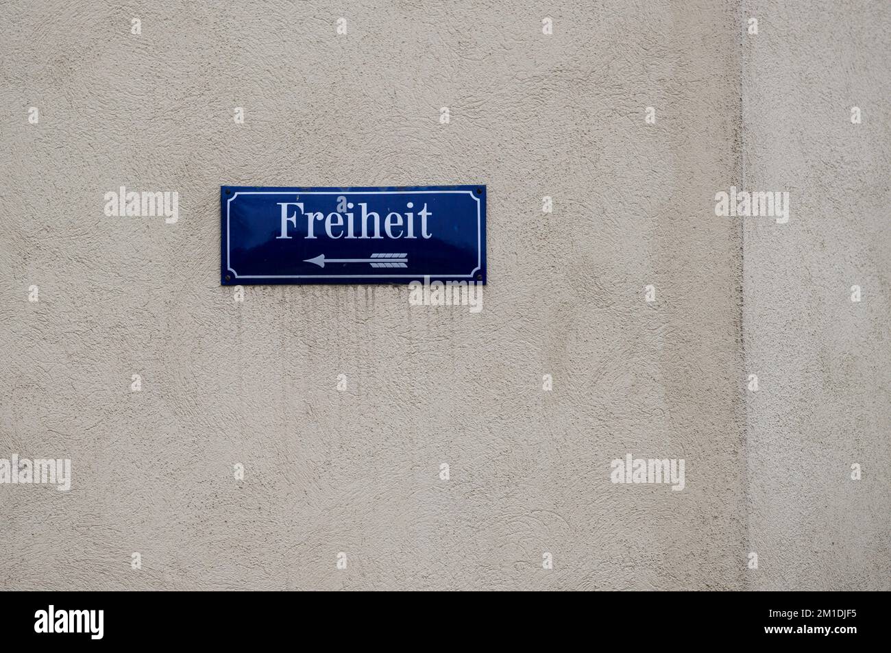 Blue sign with the street name "Freedom Stock Photo - Alamy