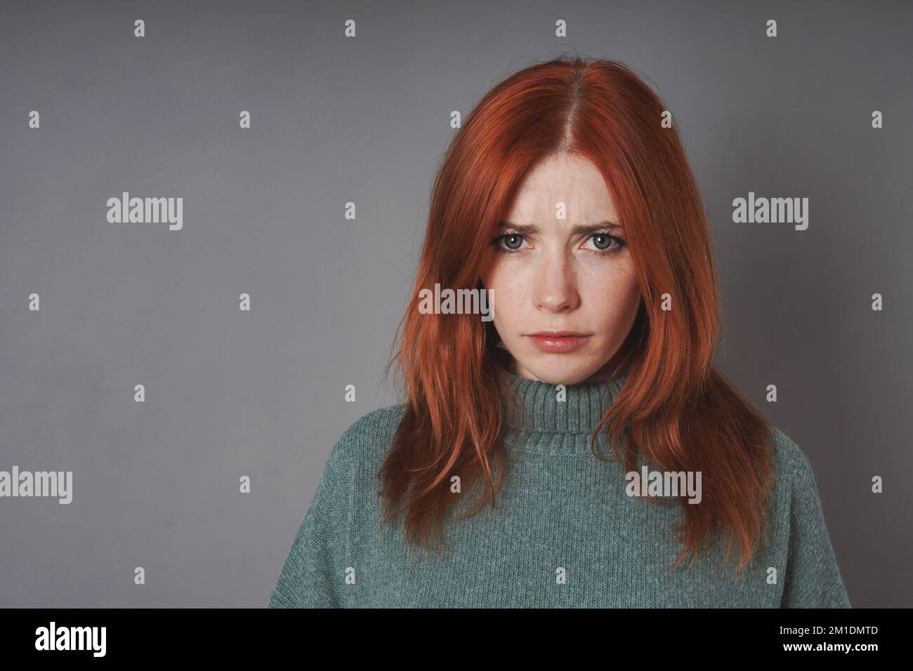 displeased young woman with worry lines Stock Photo - Alamy