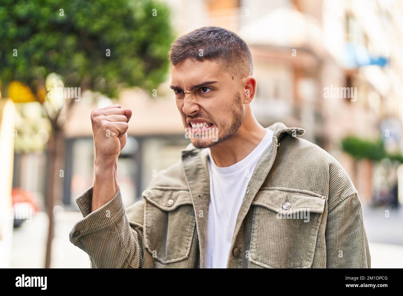 Man angry fist outside hi-res stock photography and images - Alamy