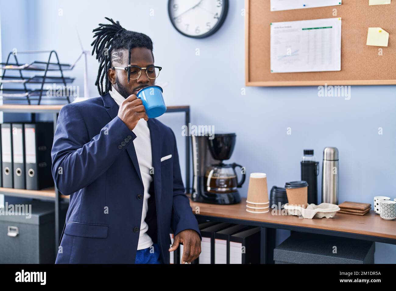 African american woman business worker drinking coffee at office Stock ...