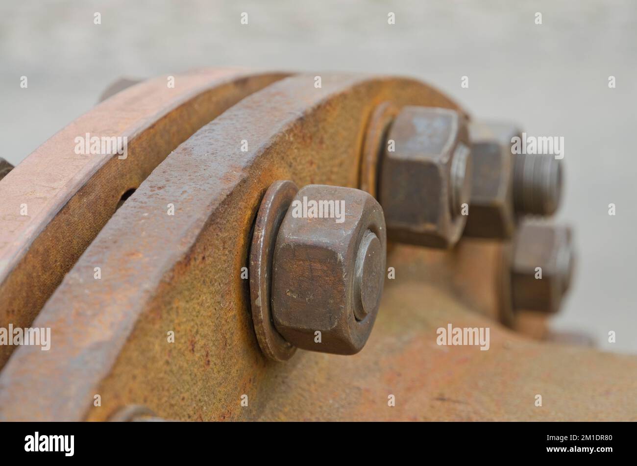 Flange of a drain pipe with screws Stock Photo - Alamy