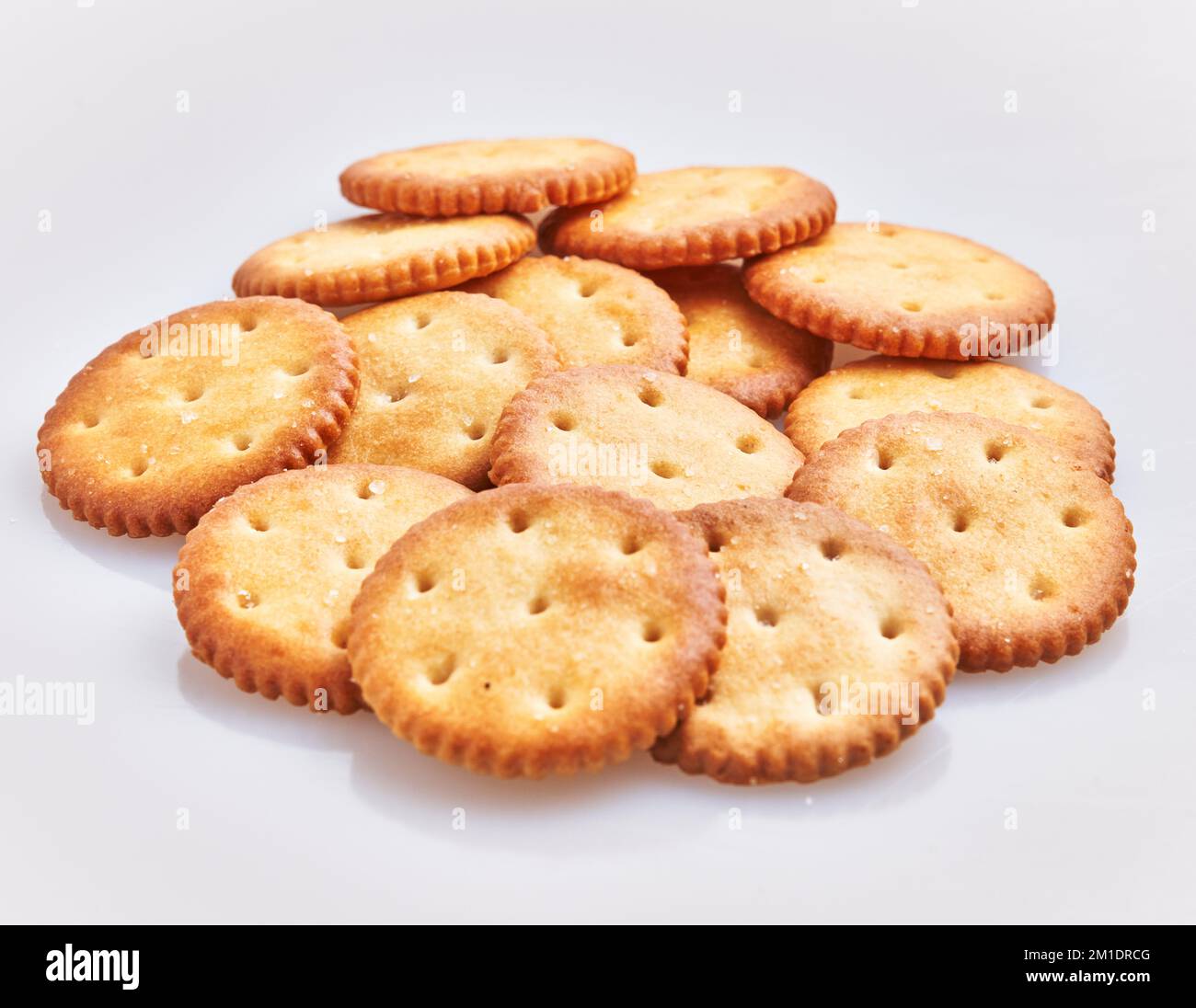 Delicious group of salty biscuits over isolated white background Stock ...