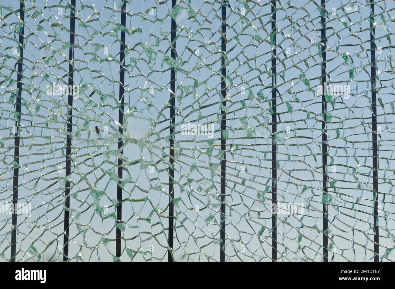 Broken glas of a safety screen along a road crossing a bridge Stock ...