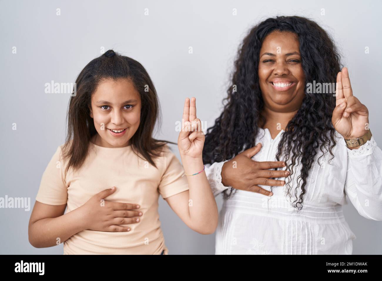 Women hand chest trust hi-res stock photography and images - Alamy