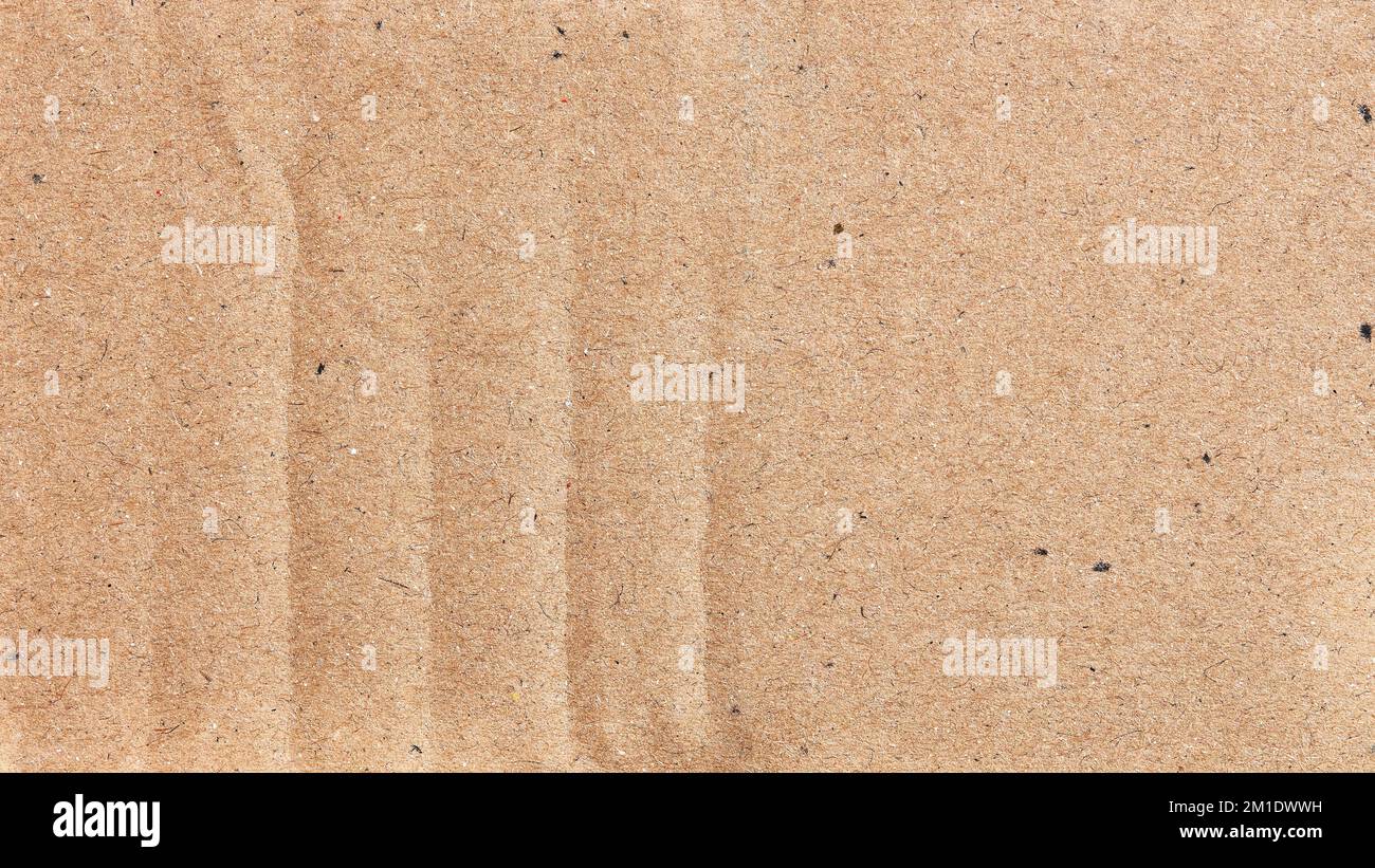 Brown cardboard carton material texture background Stock Photo - Alamy