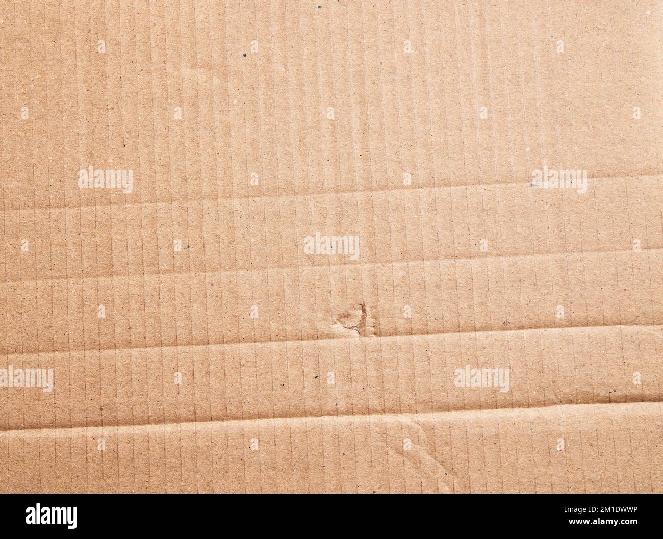 Brown cardboard carton material texture background Stock Photo - Alamy