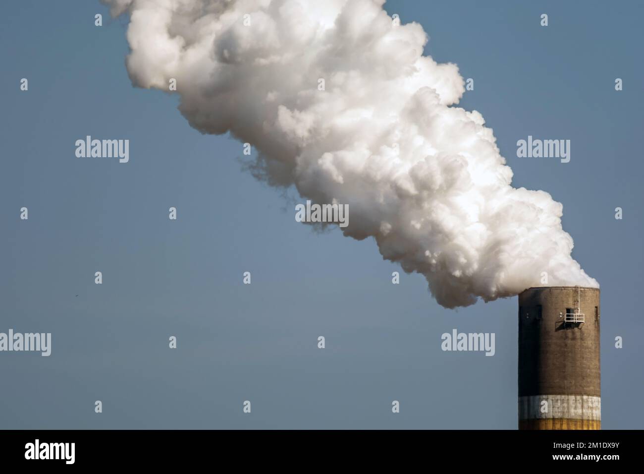 Highly smoking chimney as a sign of air pollution Stock Photo - Alamy