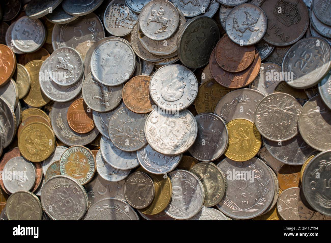 Old metal coin collectiions of various currencies Stock Photo - Alamy