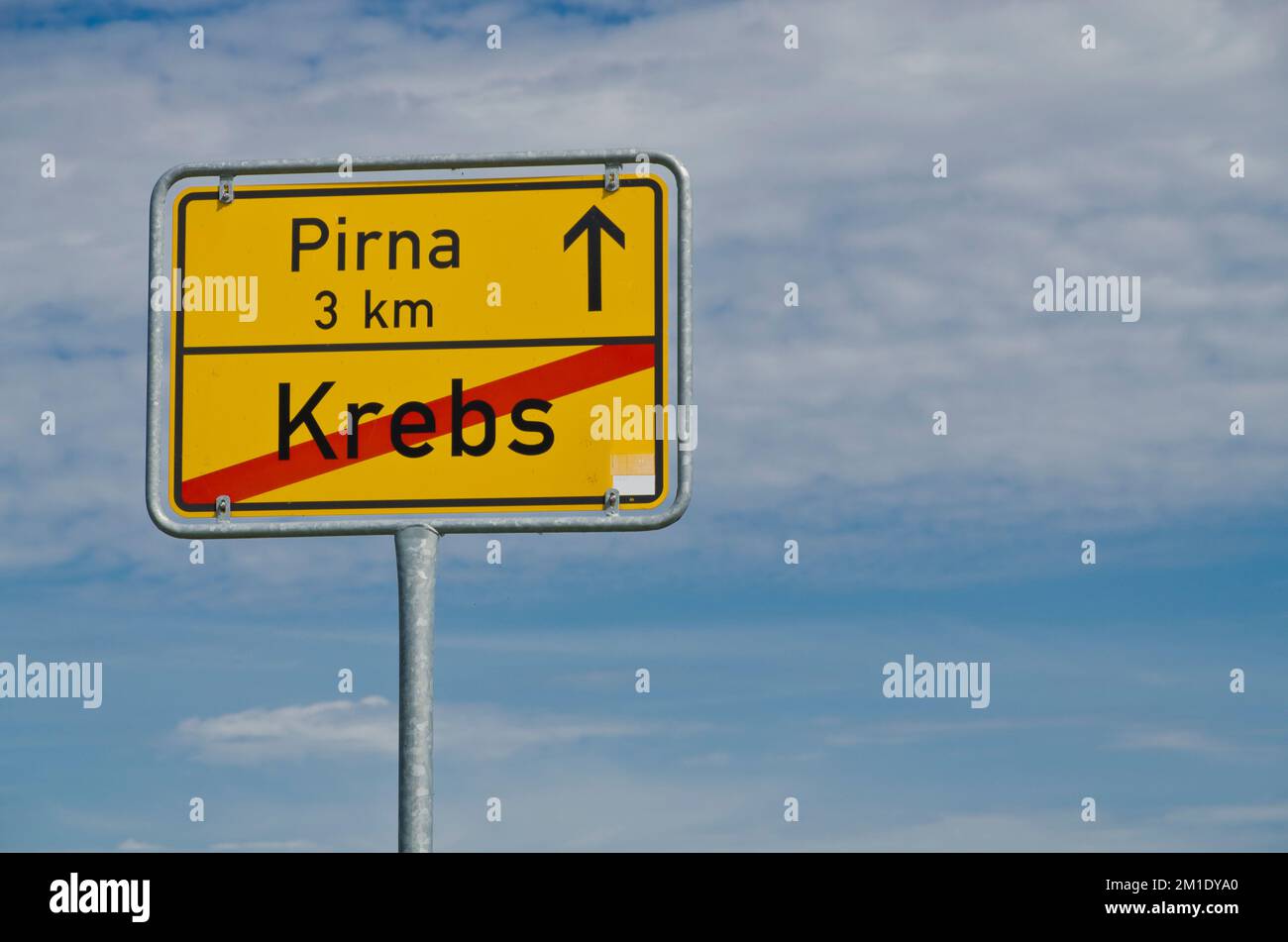 Exit town sign of an village, meaning "cancer" in german language Stock ...