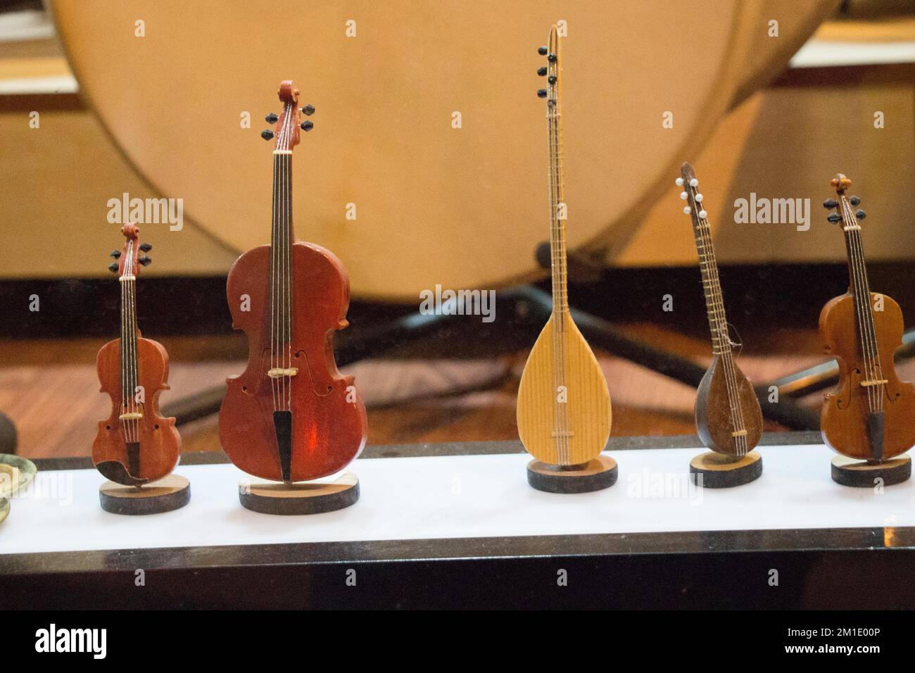 Set of models of musical instruments made of wood Stock Photo - Alamy