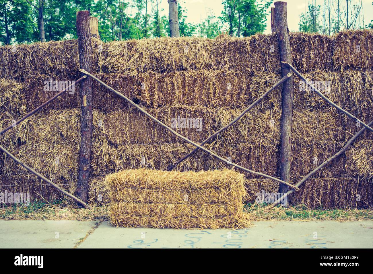 Hay bales stacks outdoors Stock Photo - Alamy
