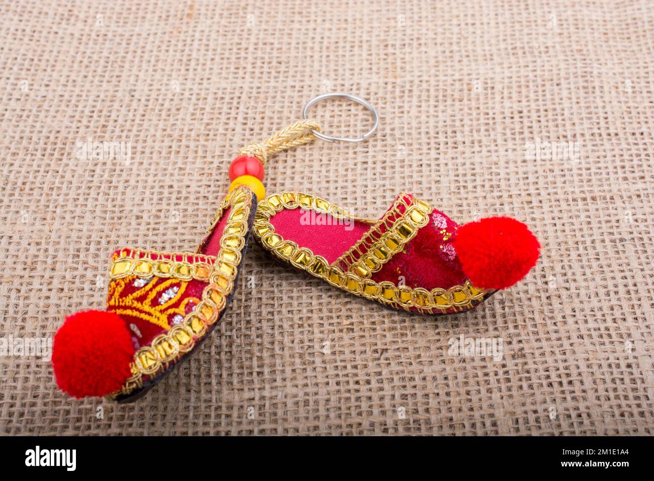 Traditional slippers on canvasvbackground Stock Photo - Alamy