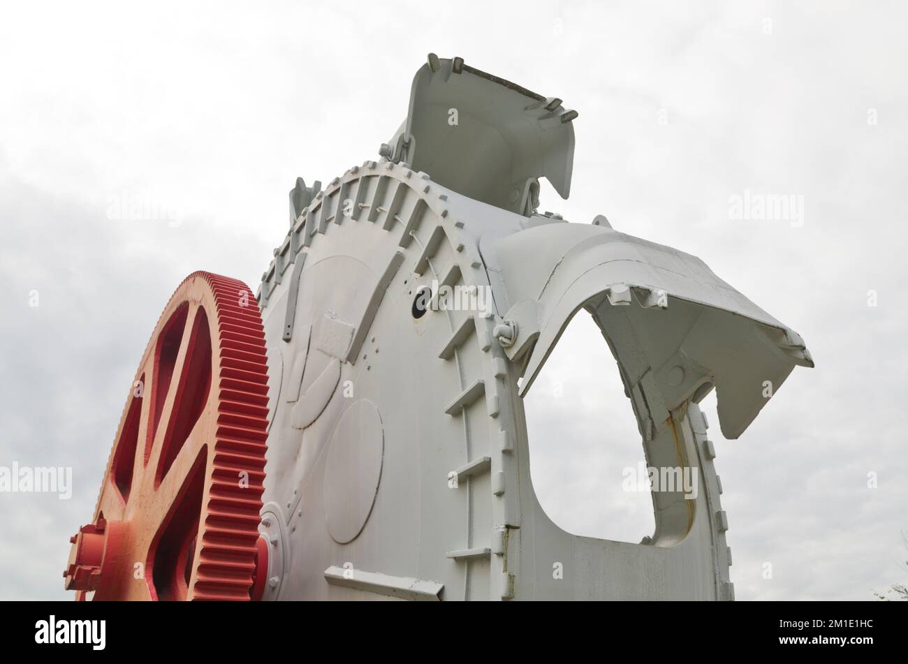 Grey bucket-wheel excavator with red cog wheel Stock Photo - Alamy