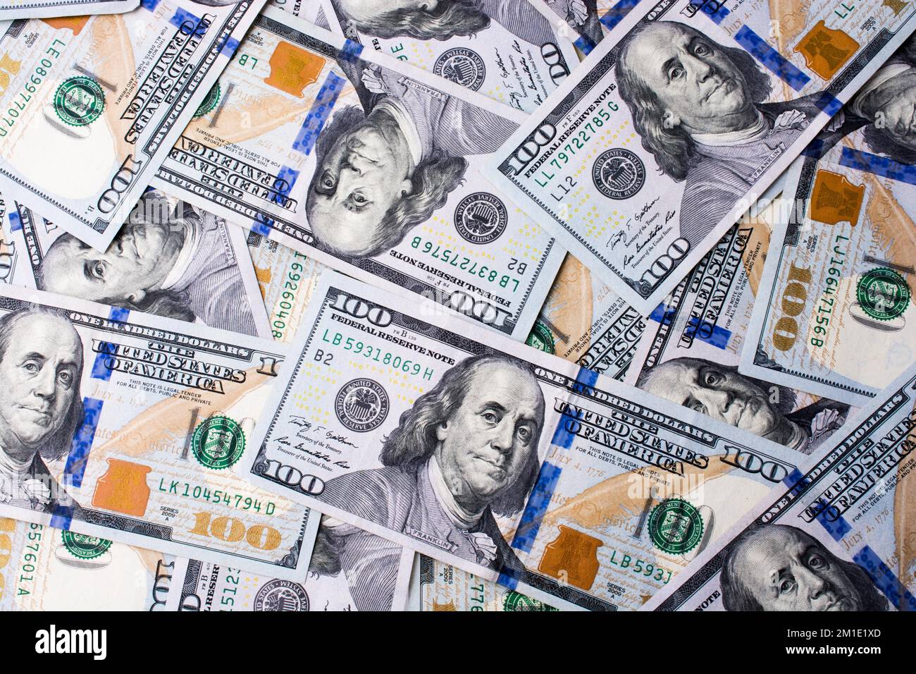 American 100 dollar banknotes made of paper placed on white background ...