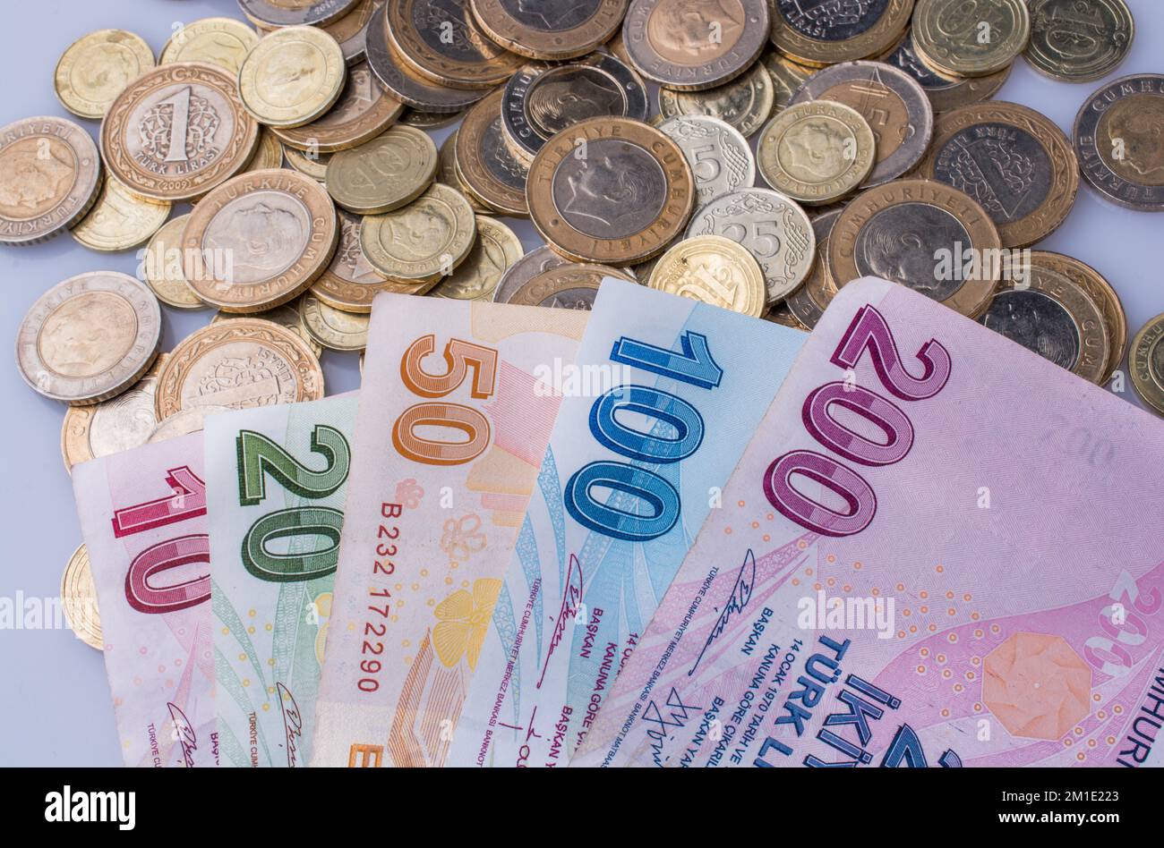 Turkish Lira coins and banknotes side by side on white background Stock ...