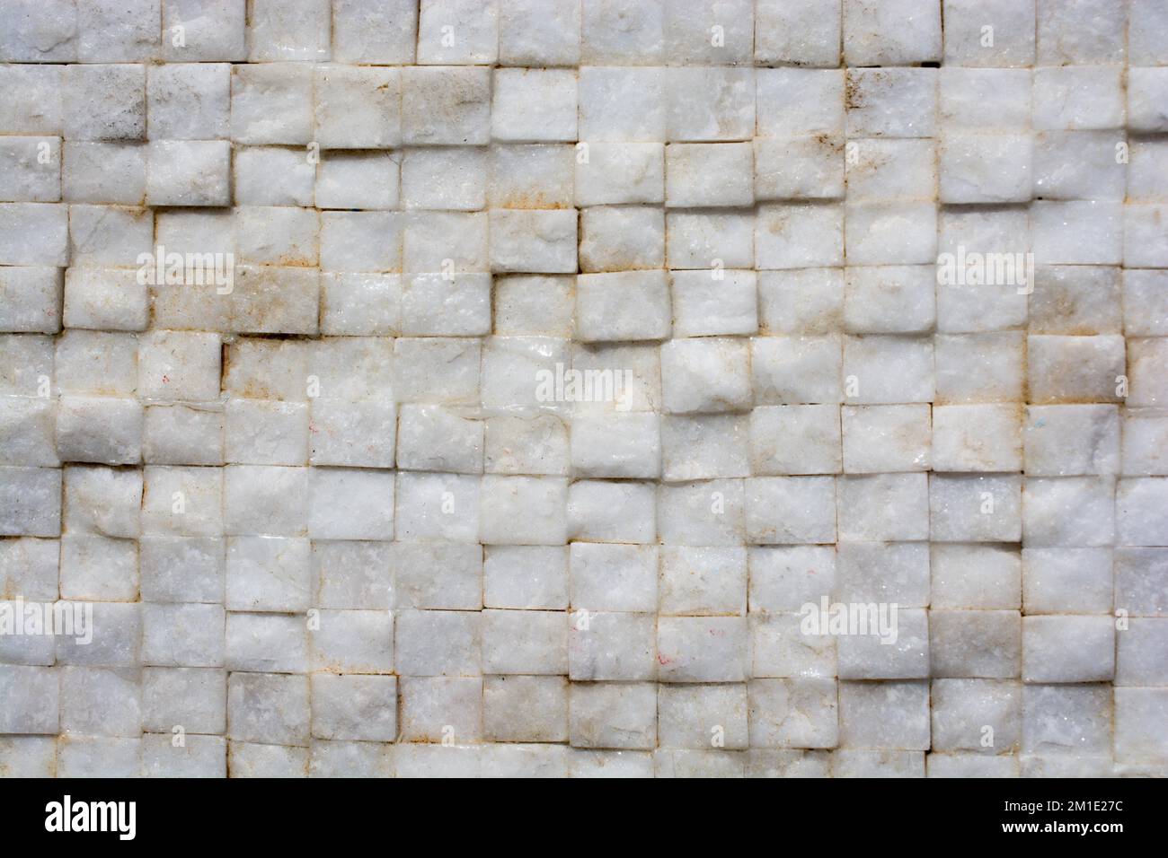 Decorative stone background built of little stones Stock Photo - Alamy