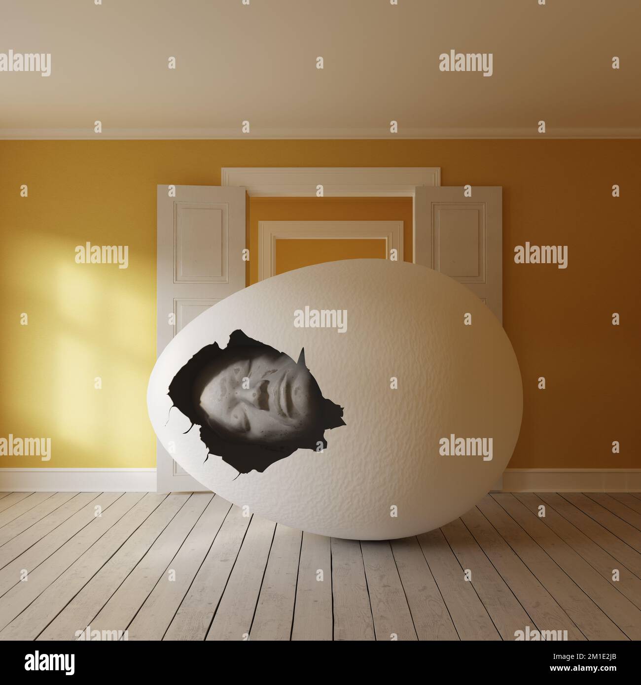 Egg with man inside isolated on gray background Stock Photo - Alamy