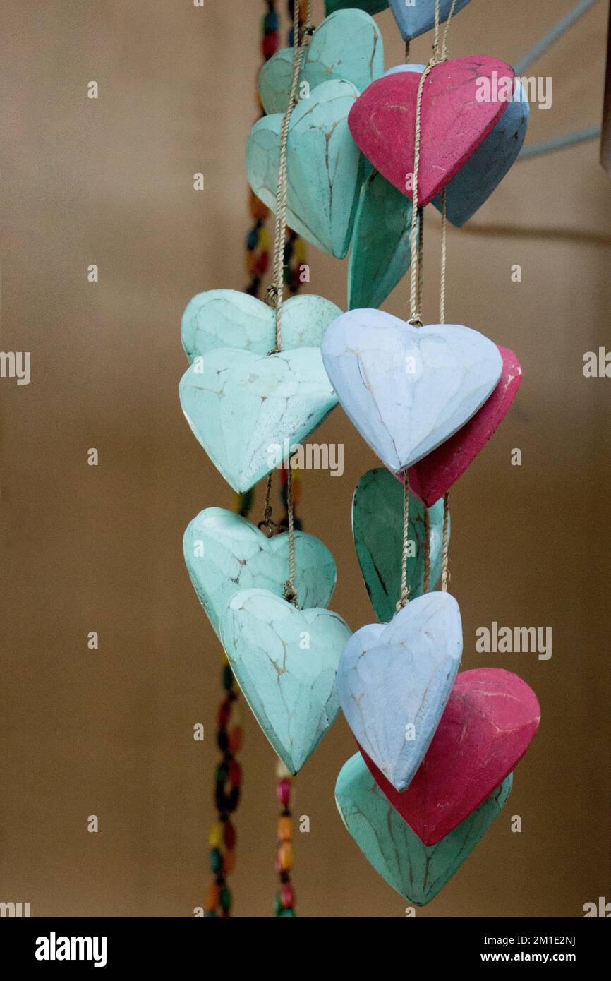 Little heart shape object hanging in the air Stock Photo - Alamy
