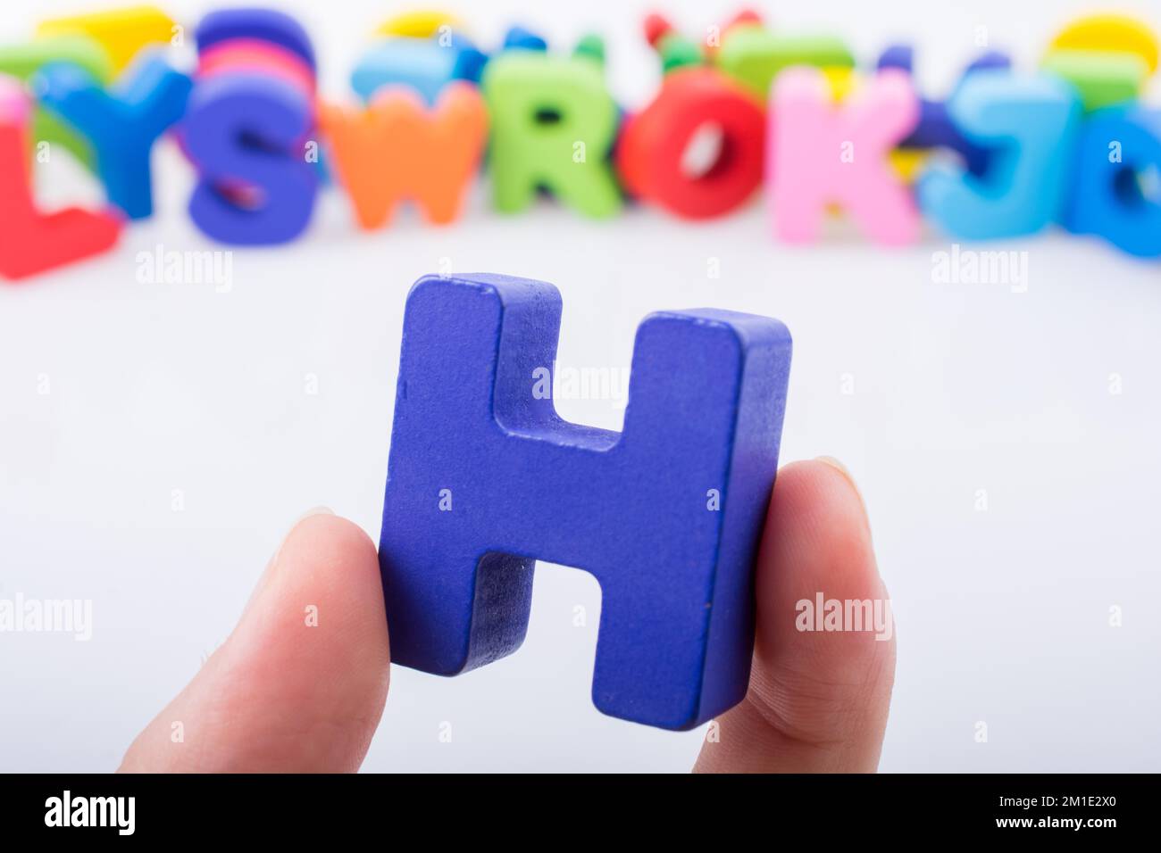 Letter cubes of Alphabet made of wood Stock Photo - Alamy