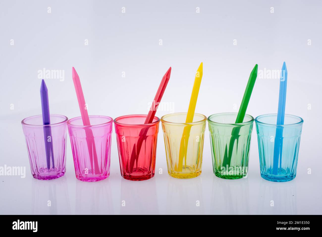 Drinking glasses of various color with patterns Stock Photo - Alamy