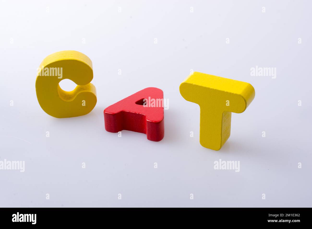 The word CAT written with colorful letter blocks Stock Photo - Alamy