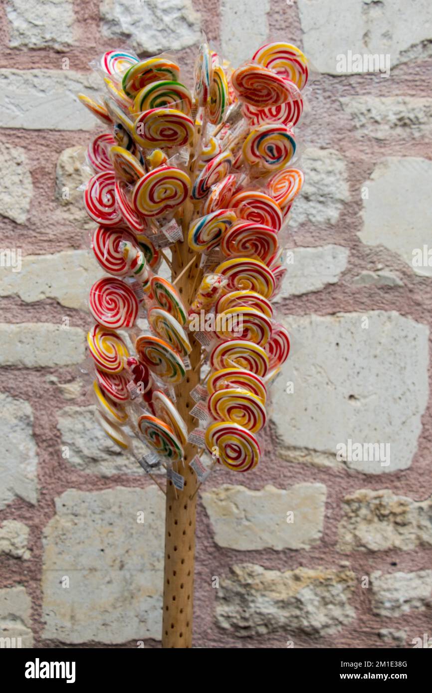 Delicious colorful swirl candy and sweets for kids Stock Photo - Alamy