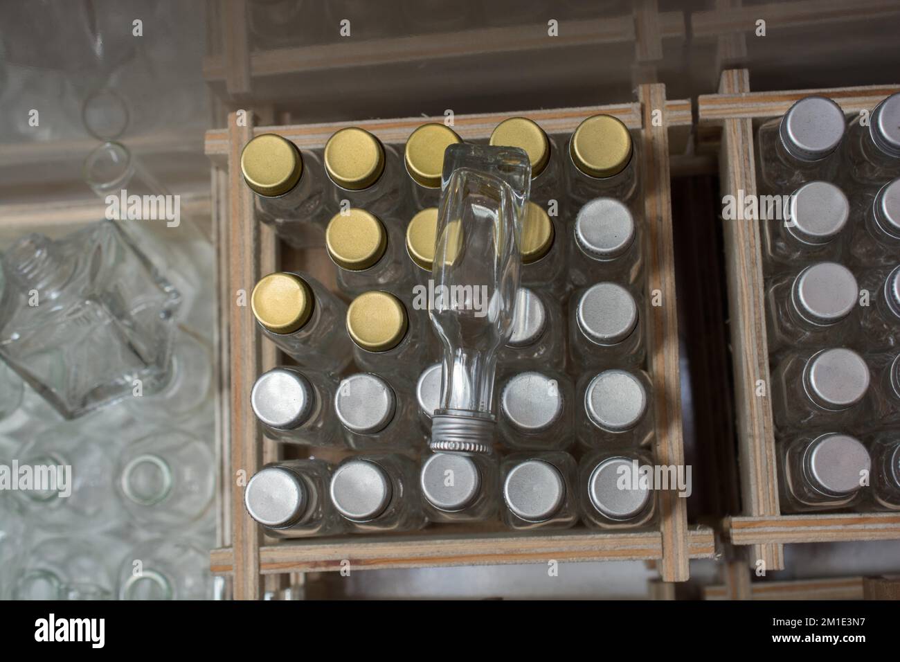 Set of Empty small transparent bottles in a box Stock Photo - Alamy