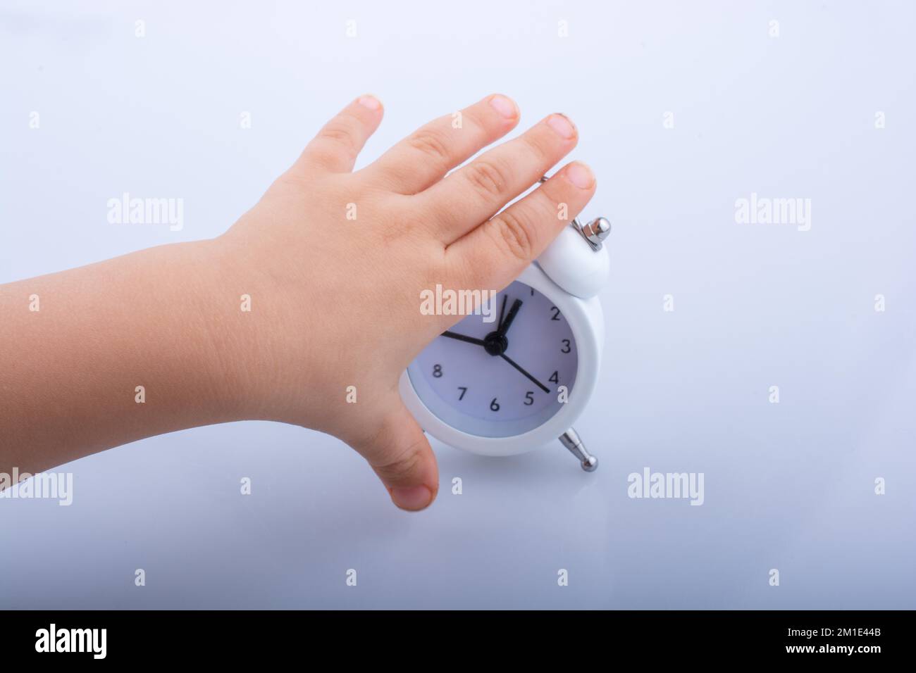 Child alarm clock hi-res stock photography and images - Alamy