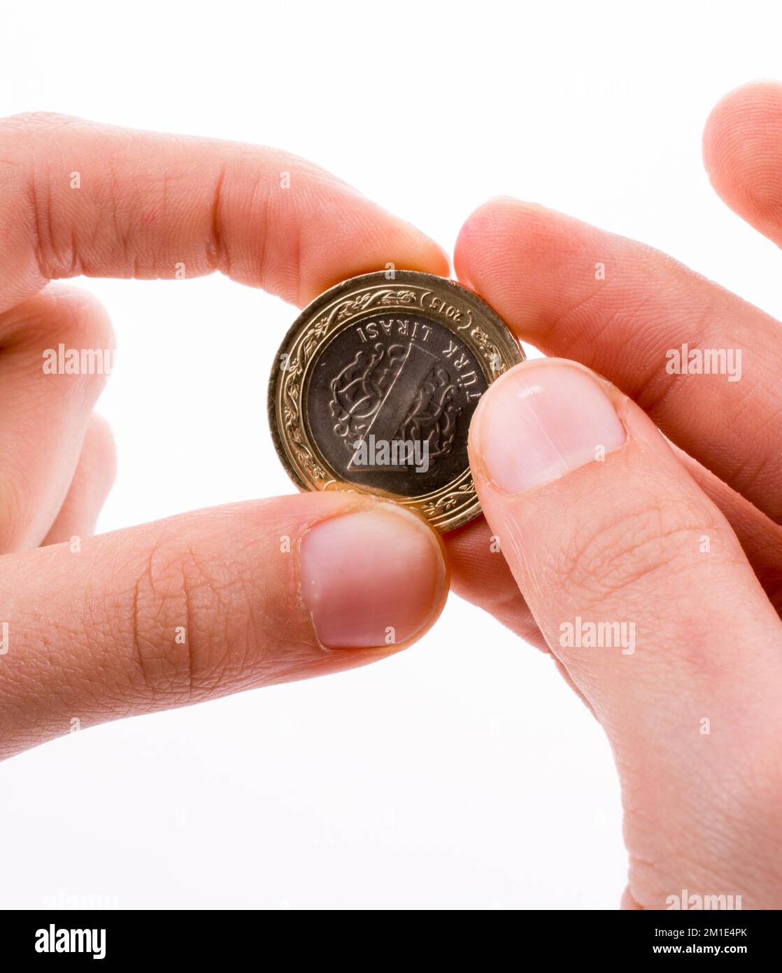Turkish coin one Turkish Lira in hand Stock Photo - Alamy