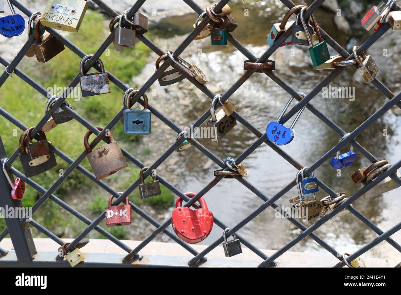 Padlocks on fence hi-res stock photography and images - Alamy