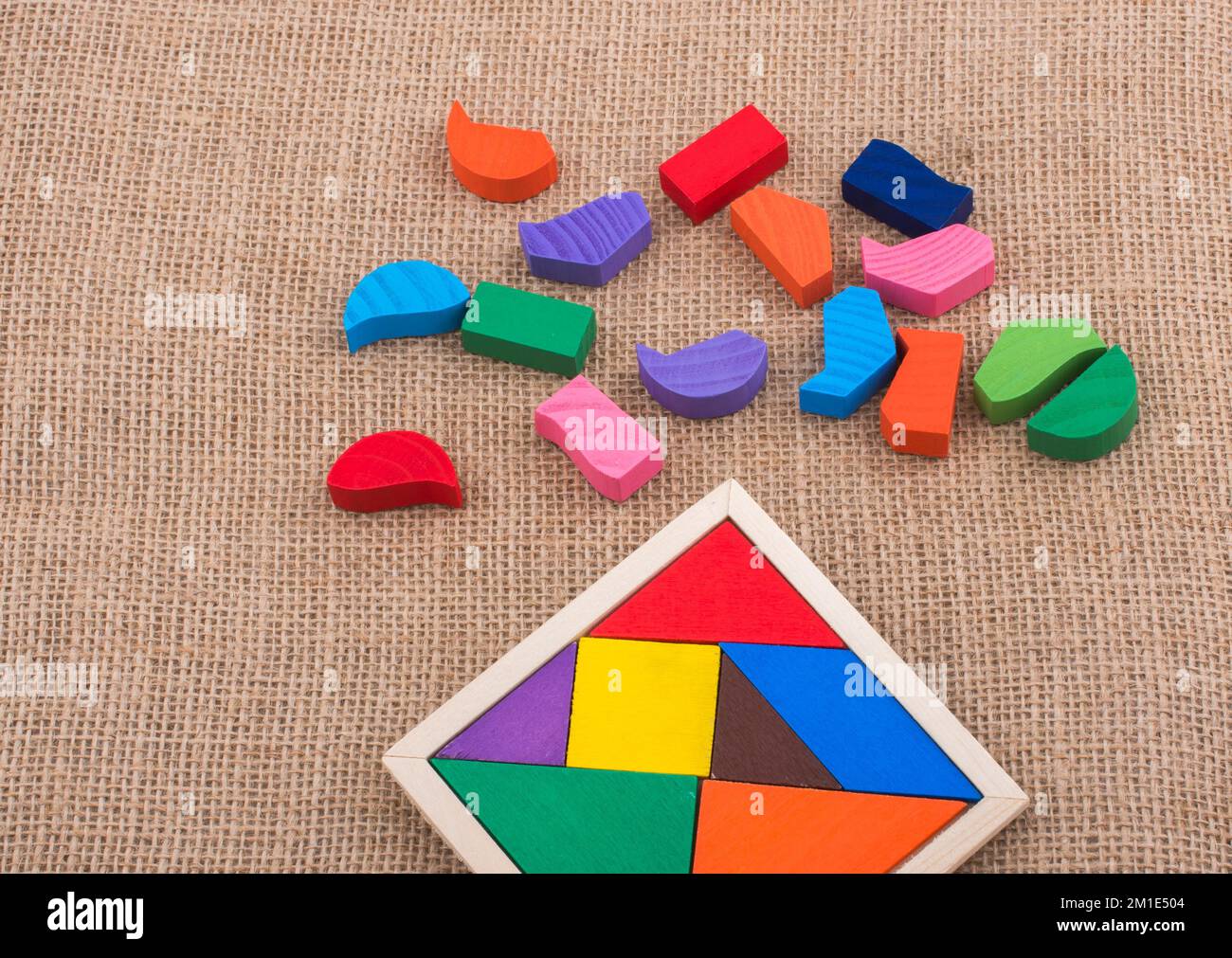 Colorful pieces of a square tangram puzzle Stock Photo - Alamy